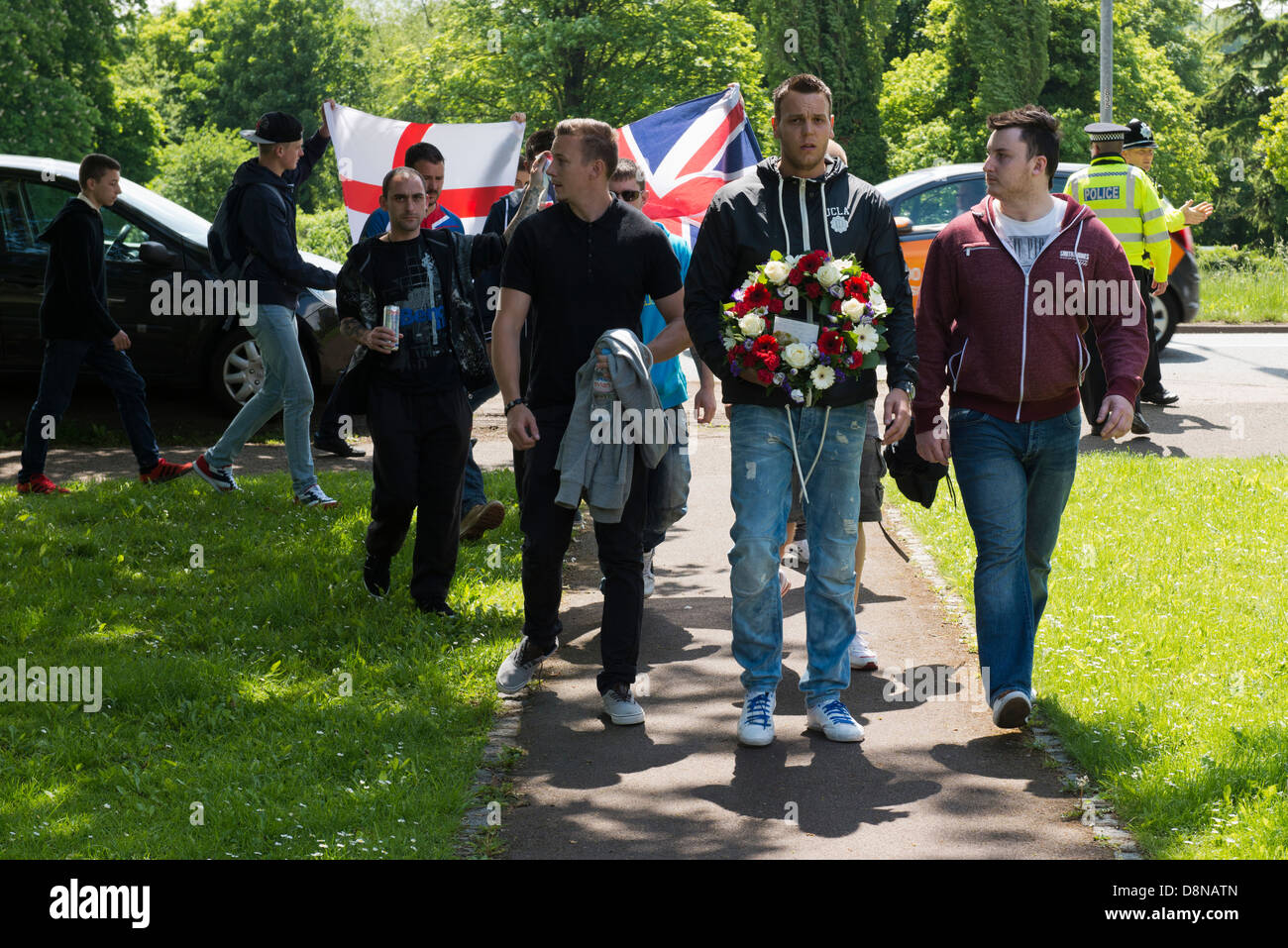 A small group of English Defense League (EDL) supporters pay their ...
