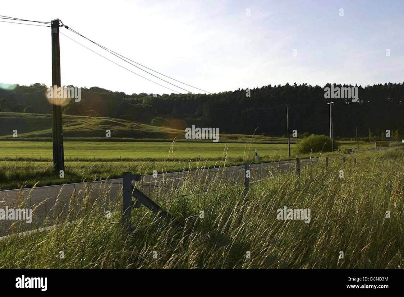 A telephone cable running alongside a road, providing communication ...