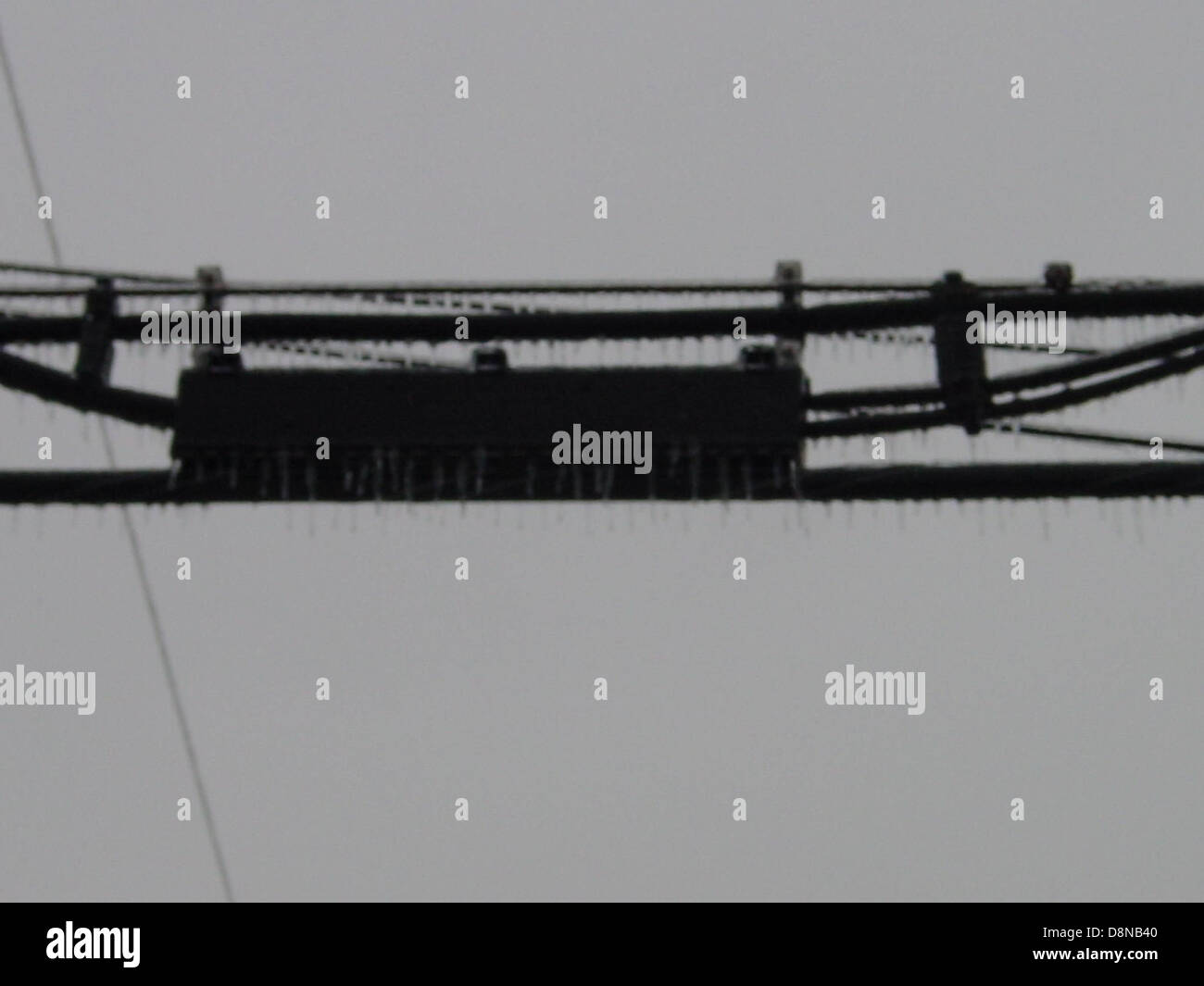 A telephone wire junction box mounted on a utility pole, with multiple ...