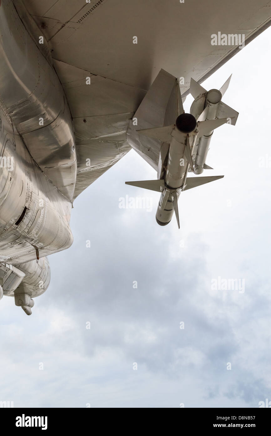 Rockets under the wing of a fighter jet Stock Photo - Alamy