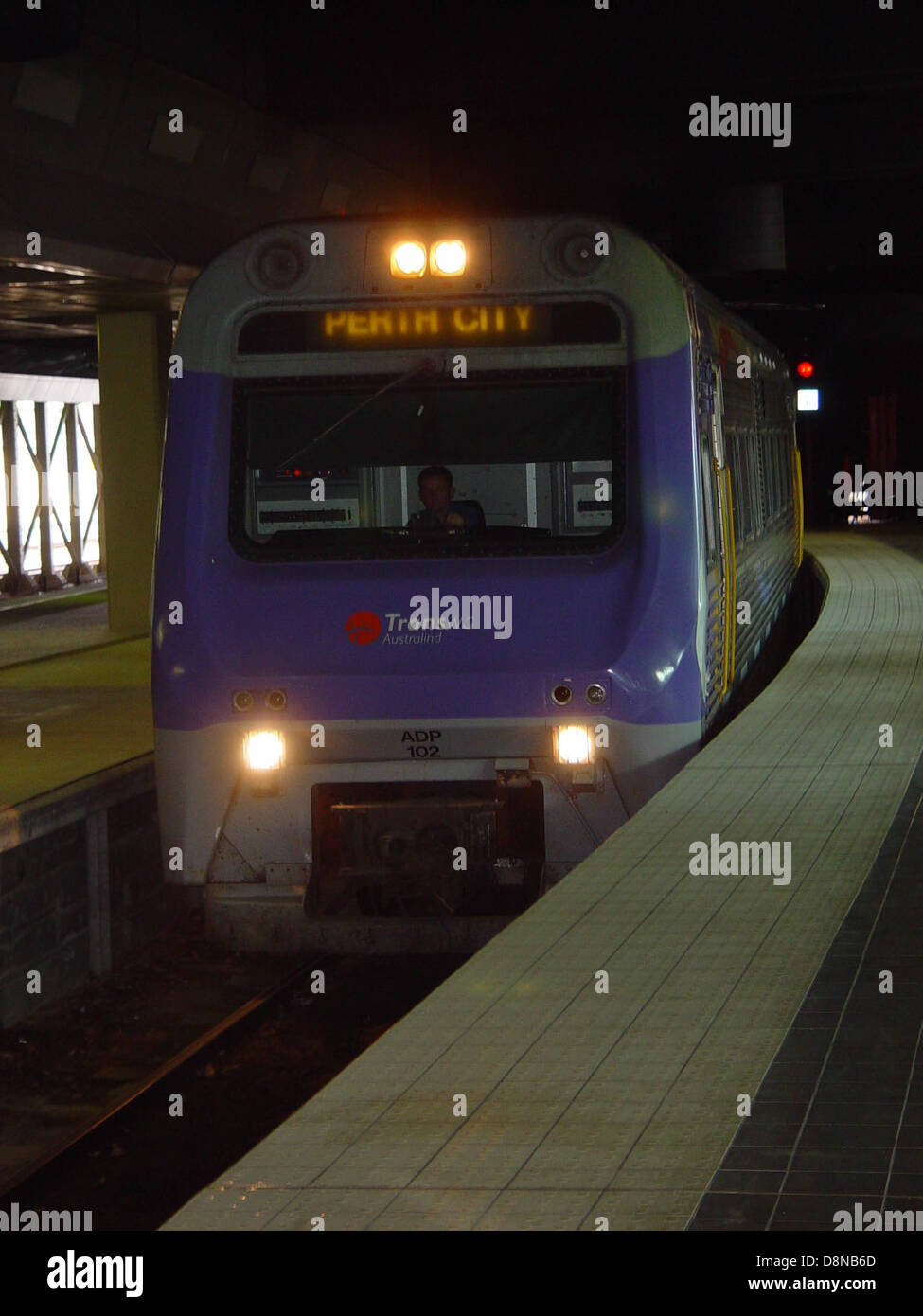 The Australind, a passenger and freight train, is shown arriving at a ...