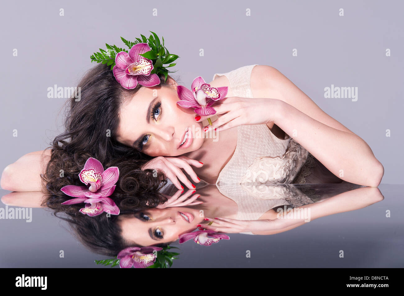 Beauty Girl With Flowers .Beautiful Model Woman Face Stock Photo - Alamy