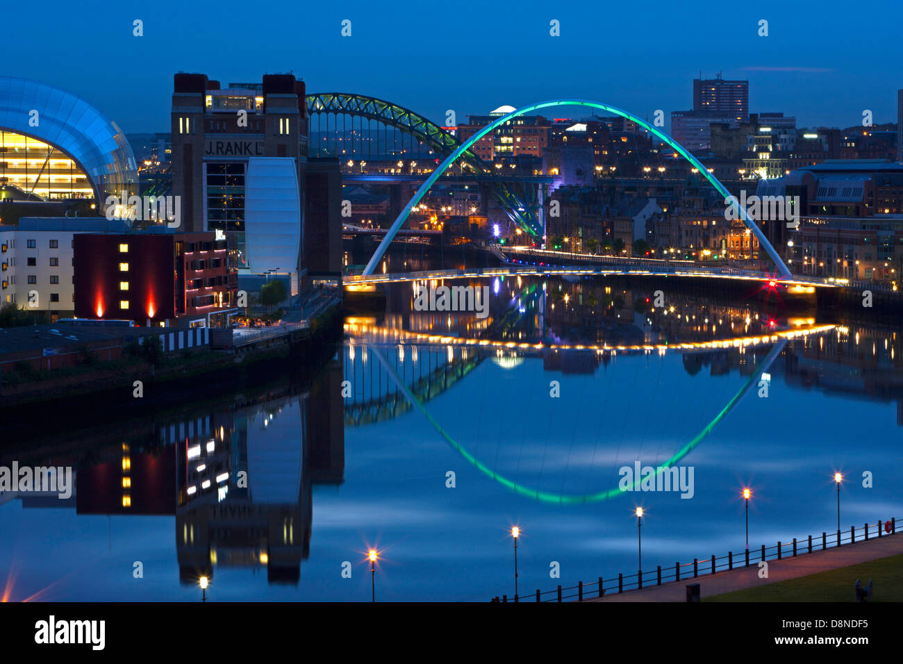 A dusk view of Newcastle and Gateshead quayside with reflections in the ...