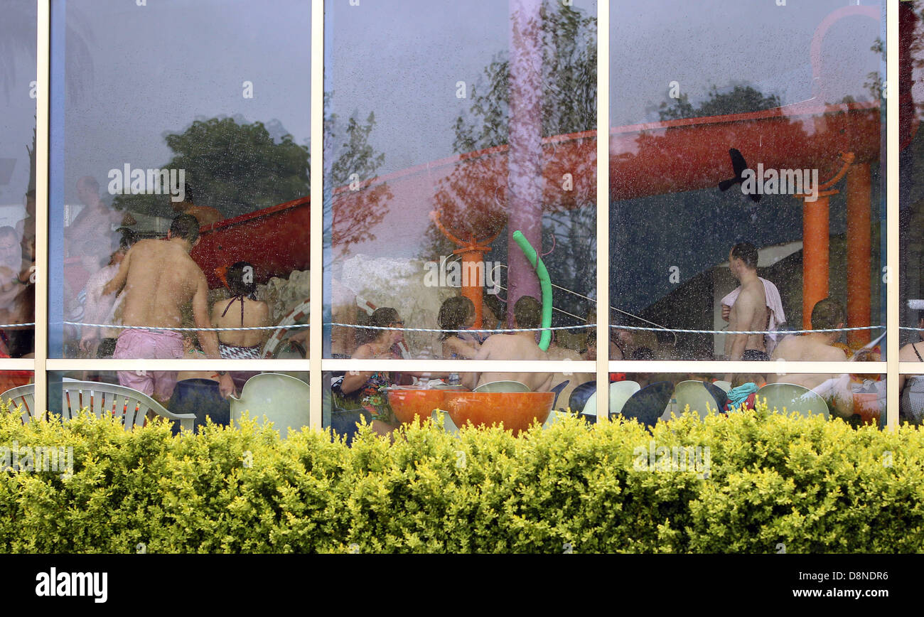 People gather near the wet window of swimming pool 'Therme' in Bad ...