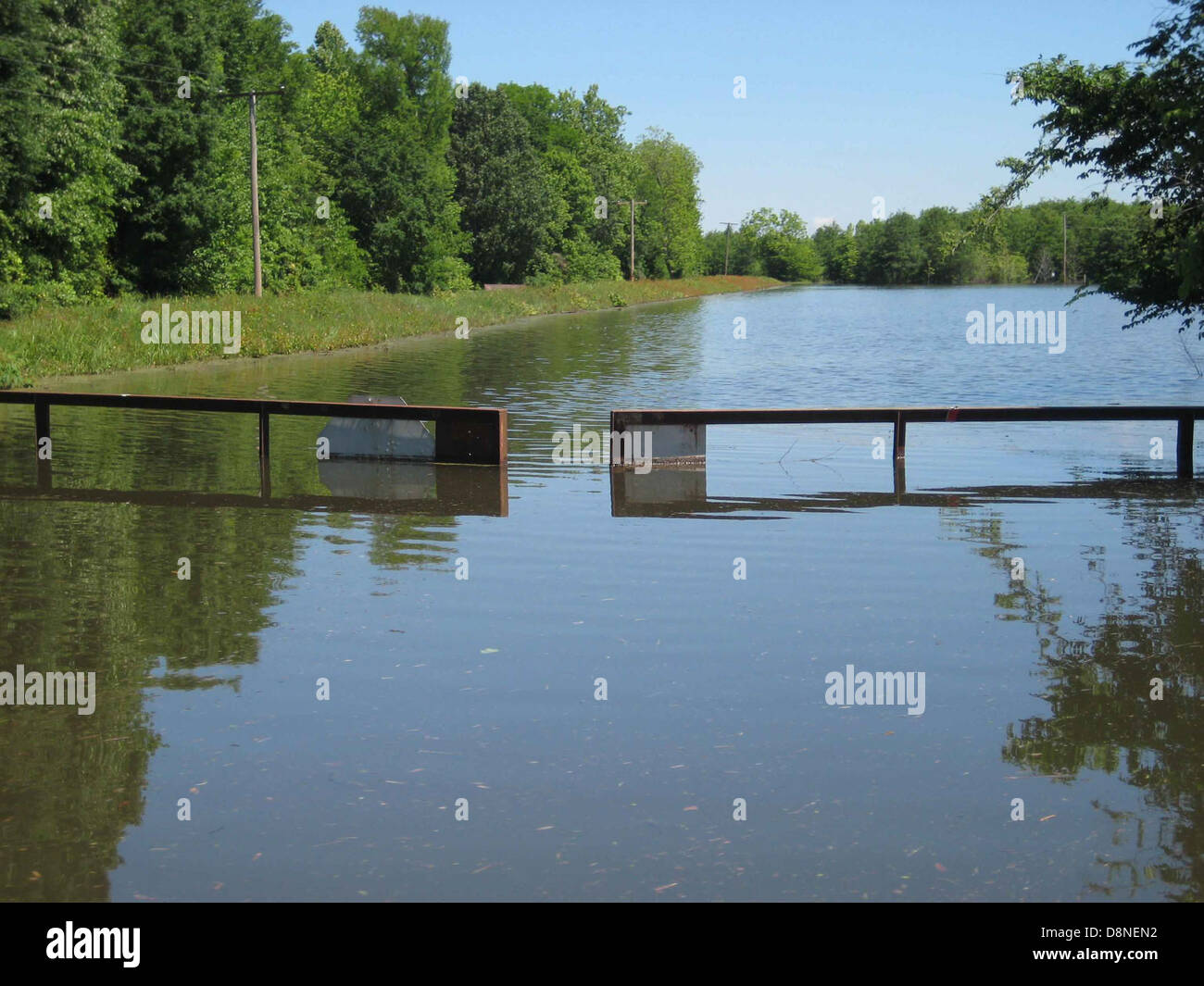 A scene depicting water flooding an area, often caused by heavy ...