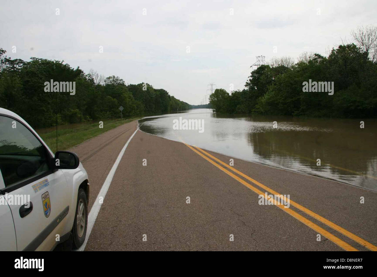 Water on highway road Stock Photo - Alamy