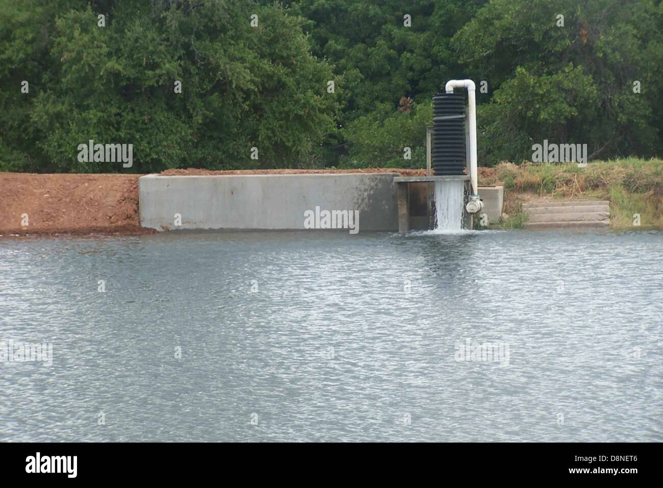 Water pump on river Stock Photo - Alamy