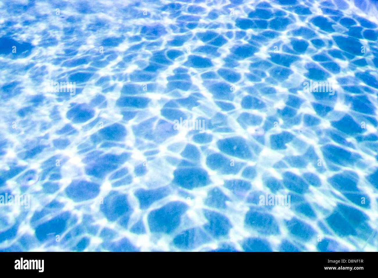 A digital wallpaper featuring a water-themed design, often depicting ...