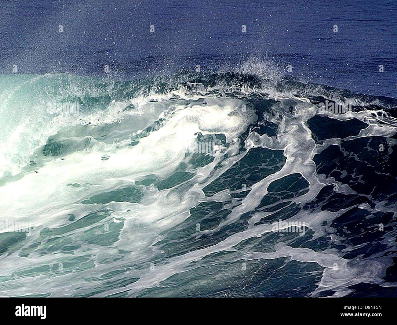 This image showcases the natural beauty of ocean waves crashing along ...