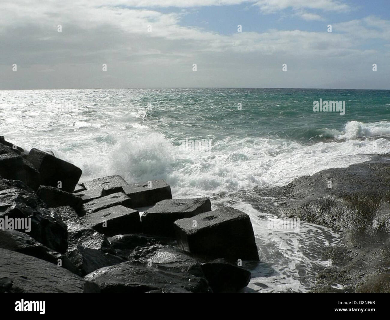 Wave hit on pier Stock Photo - Alamy