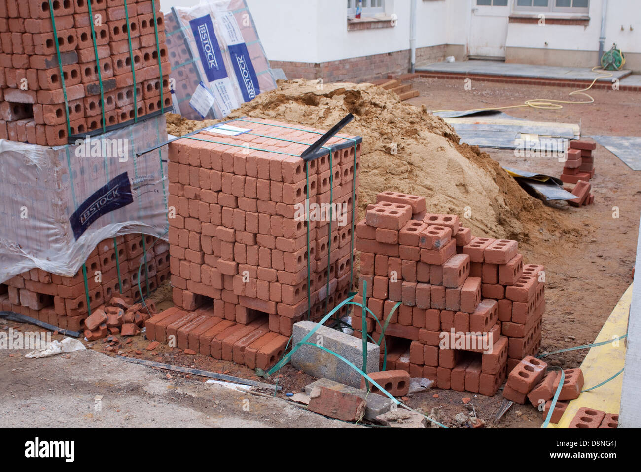 Building work taking place to build a wall Stock Photo - Alamy