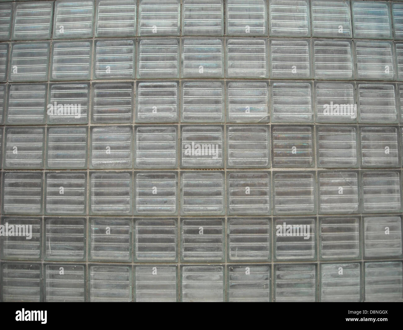 An image of an old glass window, showing wear and age with visible ...