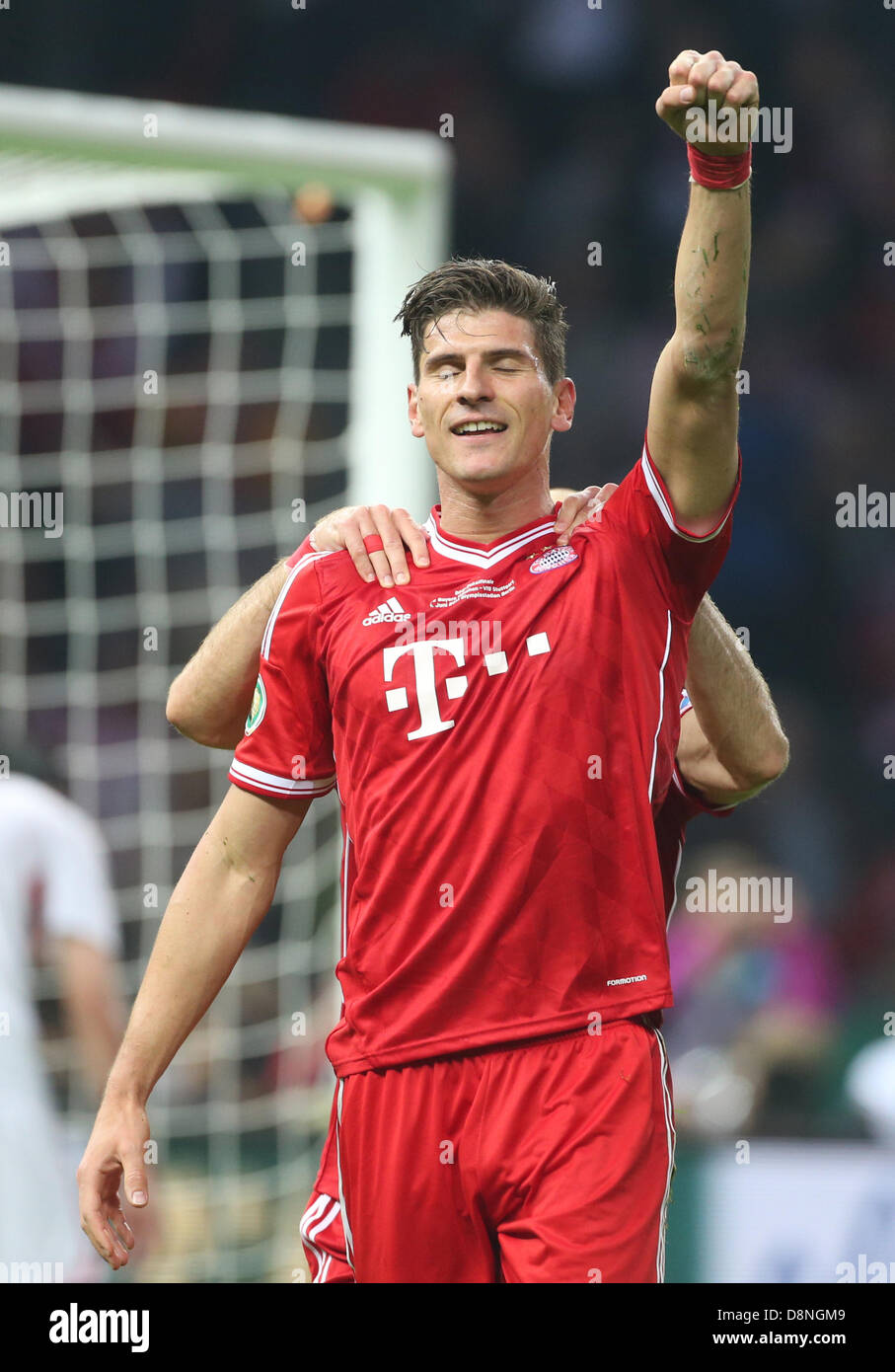 Berlin, Germany. 1st June, 2013. Munich's Mario Gomez celebrates after ...
