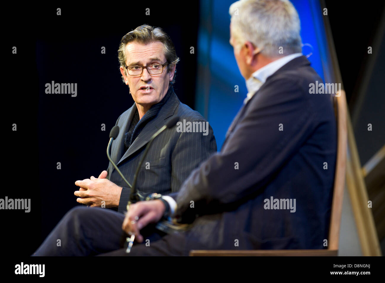 Rupert Everett actor talking about his new memoir on stage at Hay ...