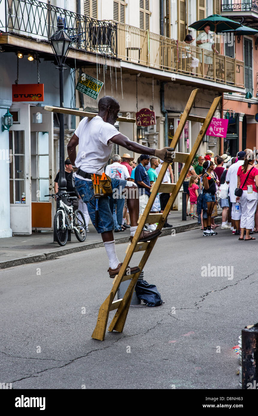 Man on Ladder to Nowhere Stock Photo - Alamy