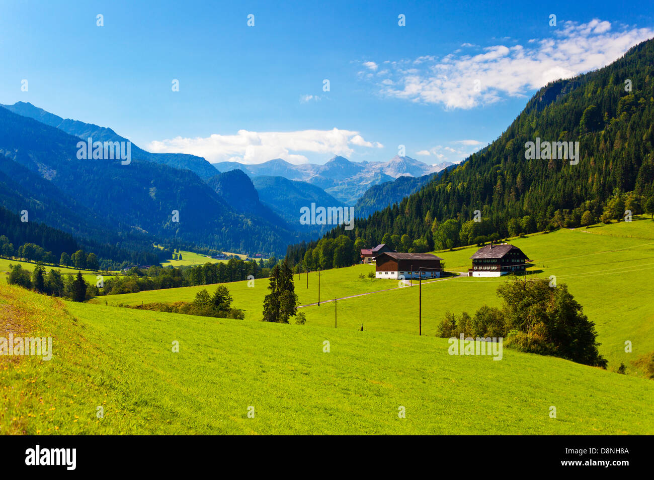 Alps mountains landscape with houses Stock Photo - Alamy