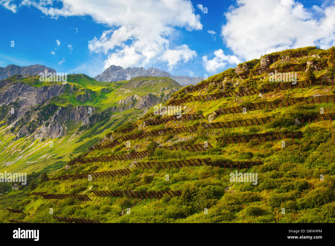 Alps mountains with avalanche defense grids Stock Photo - Alamy