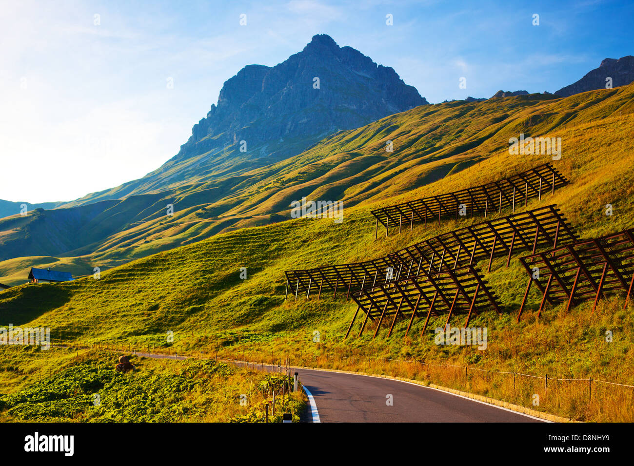 Alps mountains with avalanche defense grids Stock Photo - Alamy
