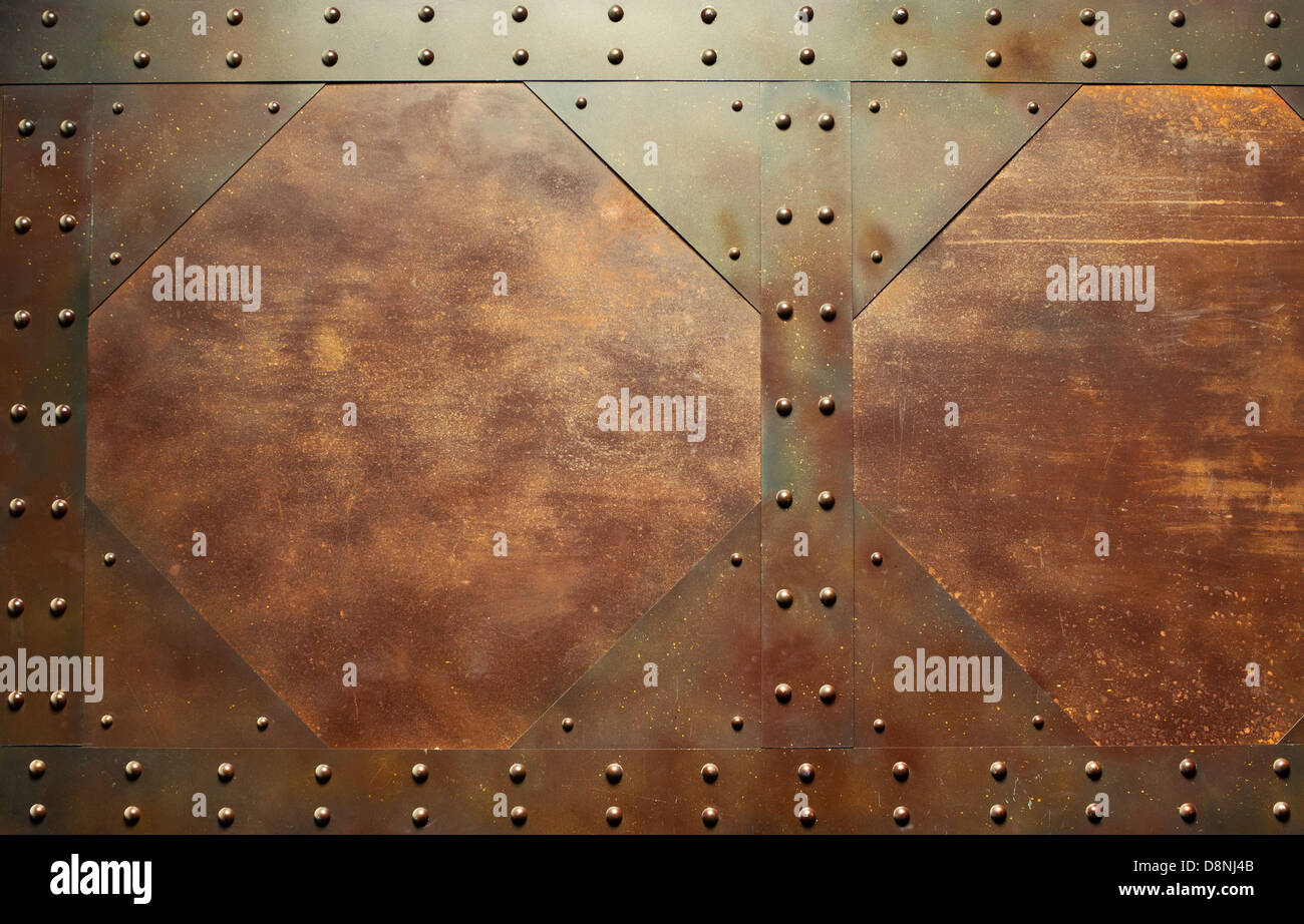 Red metal texture with rivets Stock Photo - Alamy