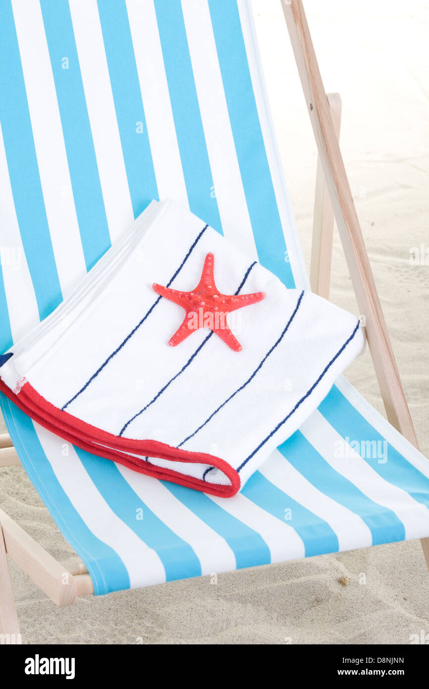 Beach chair in the sand Stock Photo - Alamy