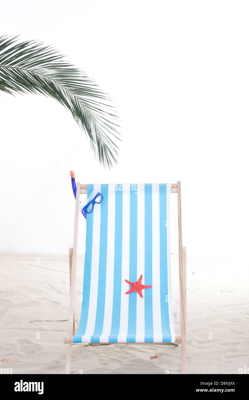 Beach chair in the sand Stock Photo - Alamy