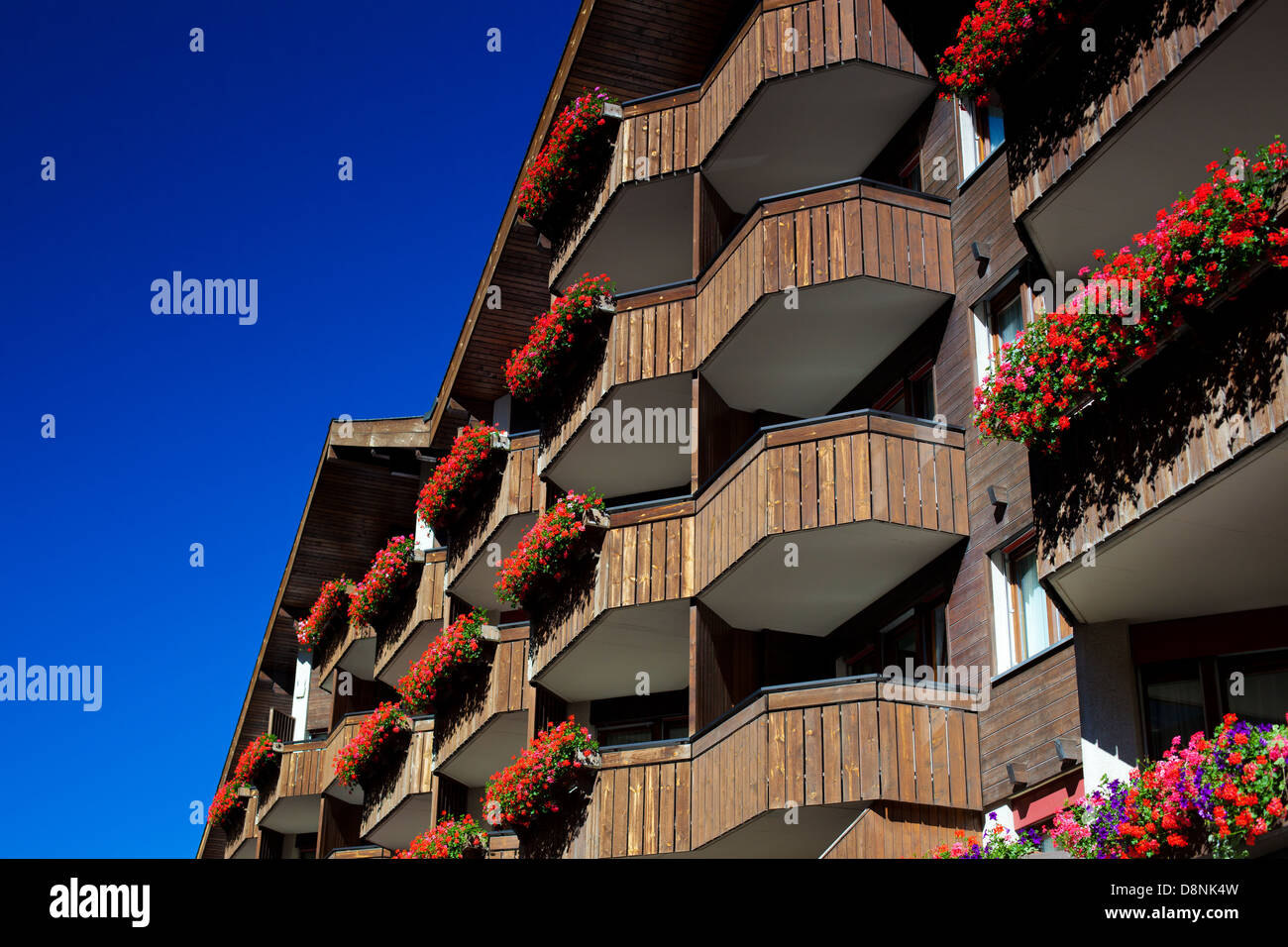 Wooden traditional house flowers hi-res stock photography and images ...