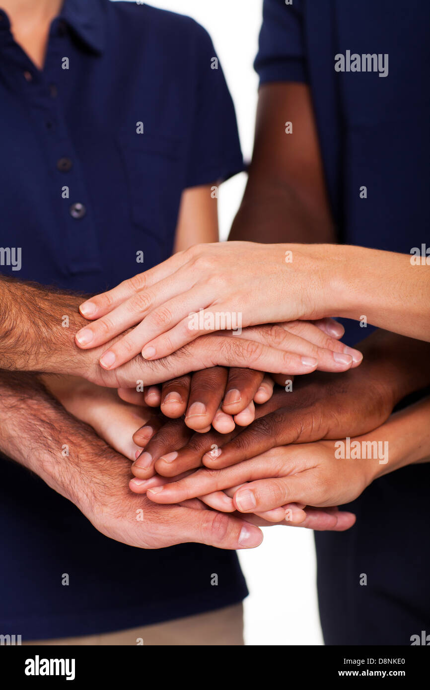 team hands together to form unity Stock Photo - Alamy