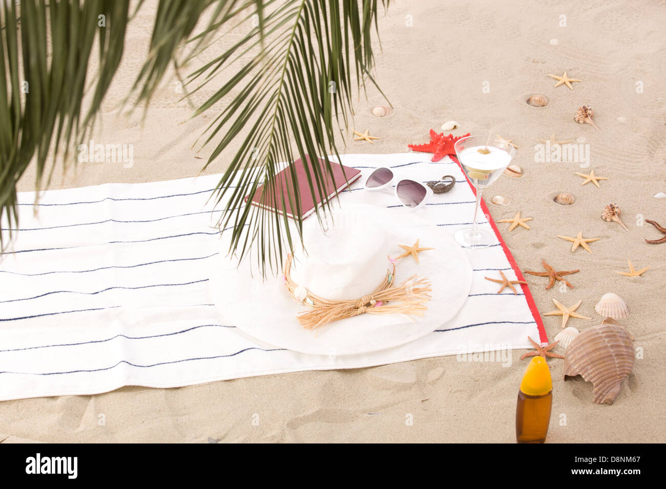 beach items on sand for fun summer holiday Stock Photo - Alamy
