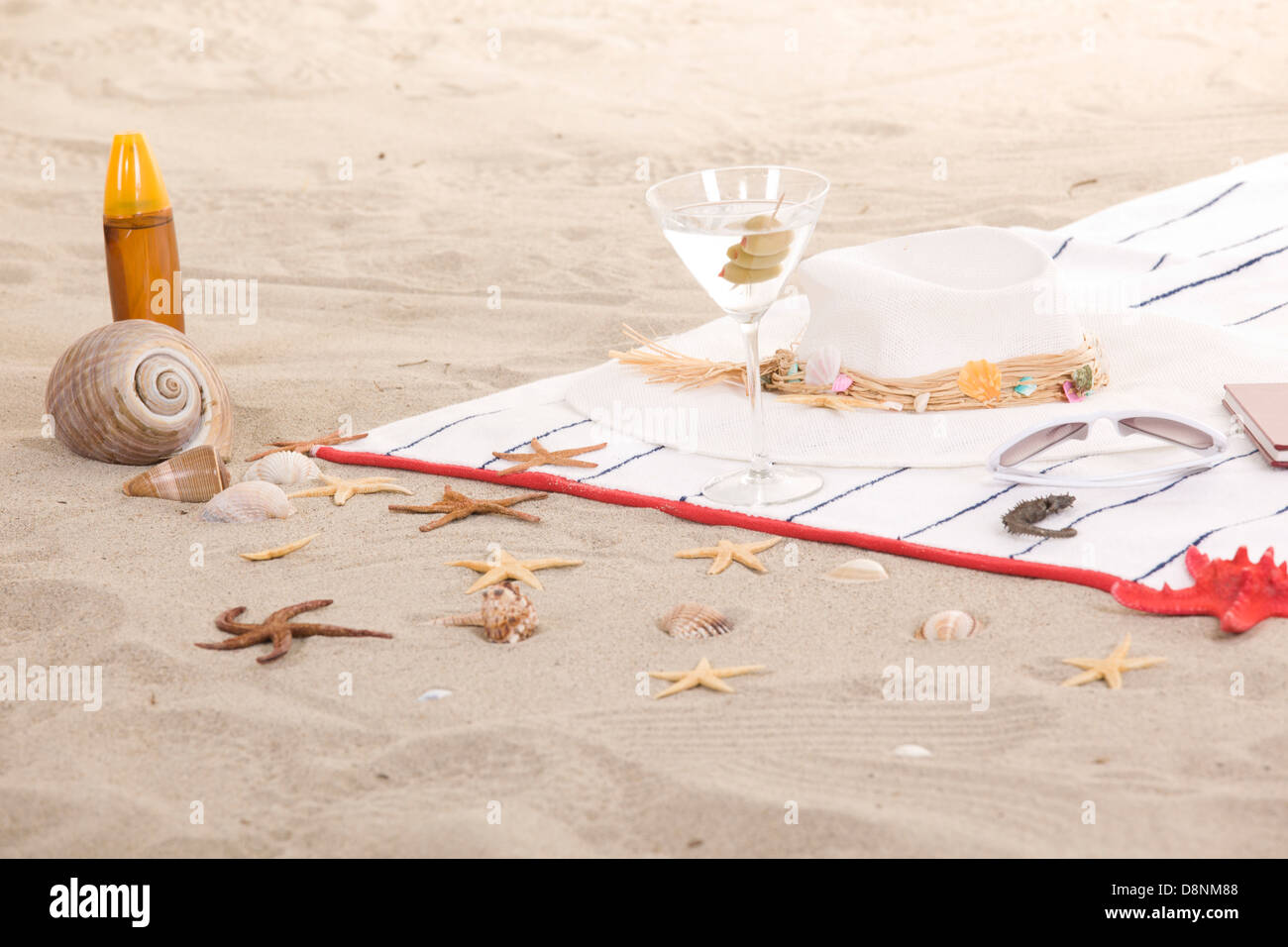 beach items on sand for fun summer holiday Stock Photo - Alamy
