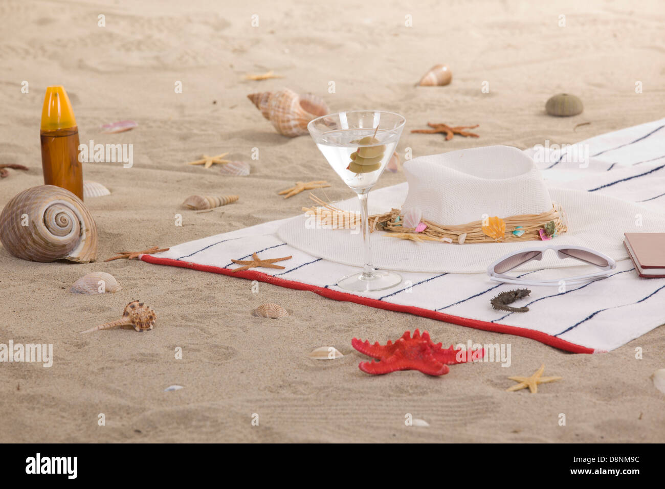 beach items on sand for fun summer holiday Stock Photo - Alamy