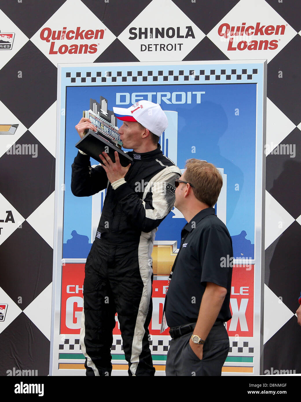 Detroit, USA. 1st June, 2013. Mike Conway (18) in the winners circle ...