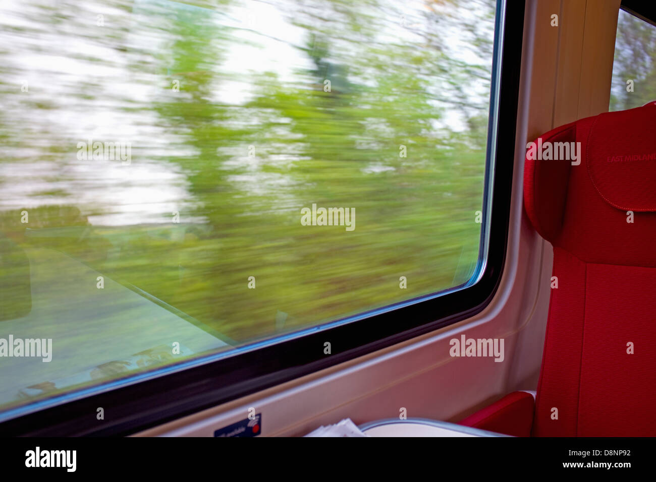 East Midlands Trains carriage window in motion Stock Photo - Alamy