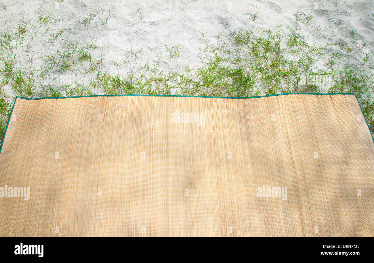Bamboo mat on the beach Stock Photo - Alamy