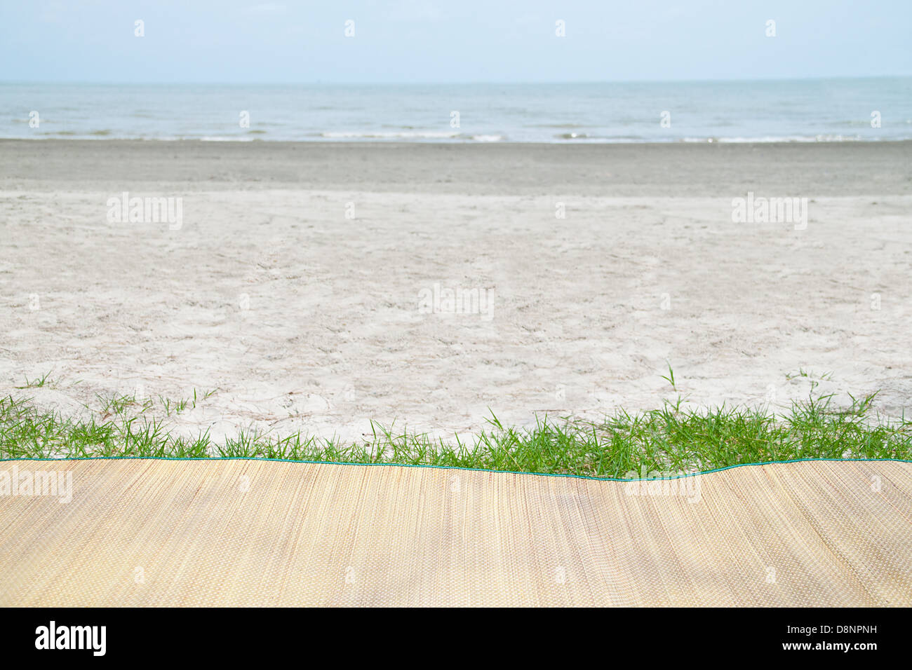 Bamboo mat on the beach Stock Photo - Alamy