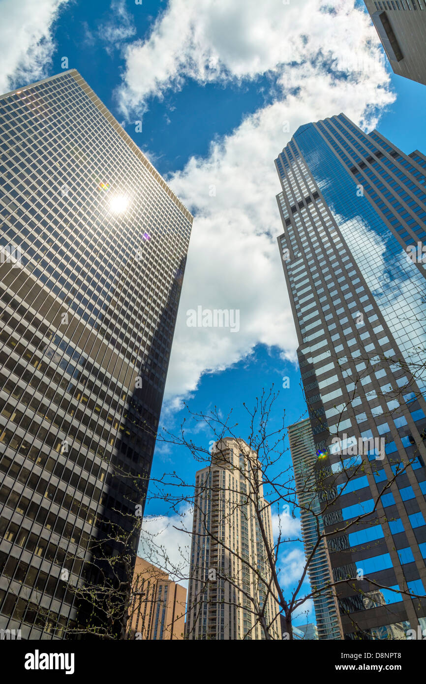 Sun reflecting in the windows of large buildings Stock Photo - Alamy