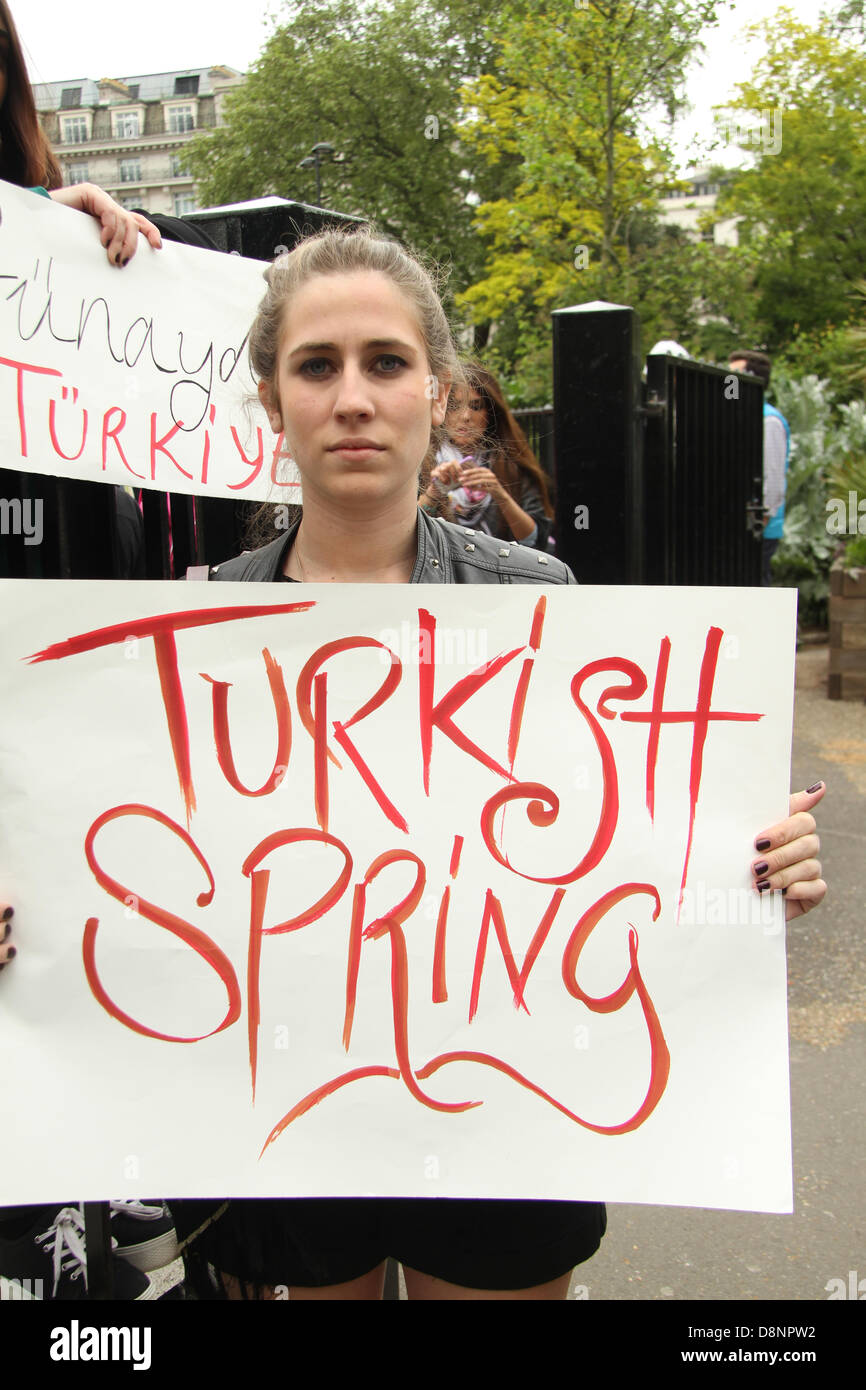 London, UK. 1st June, 2013. A Turkish demonstrator holds a placard with ...