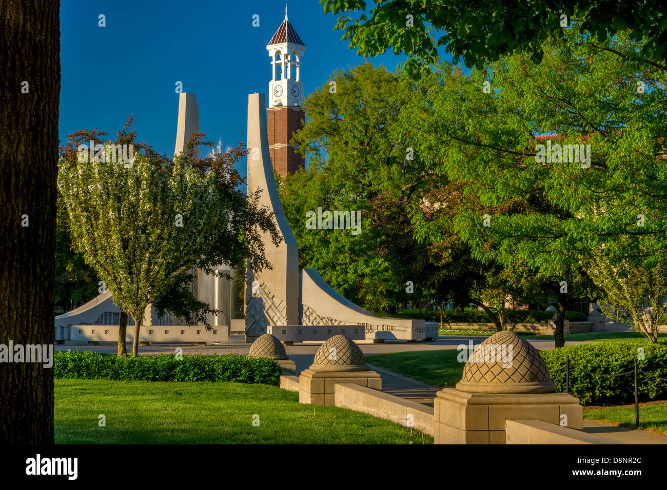 University campus with clock and fountain Stock Photo - Alamy