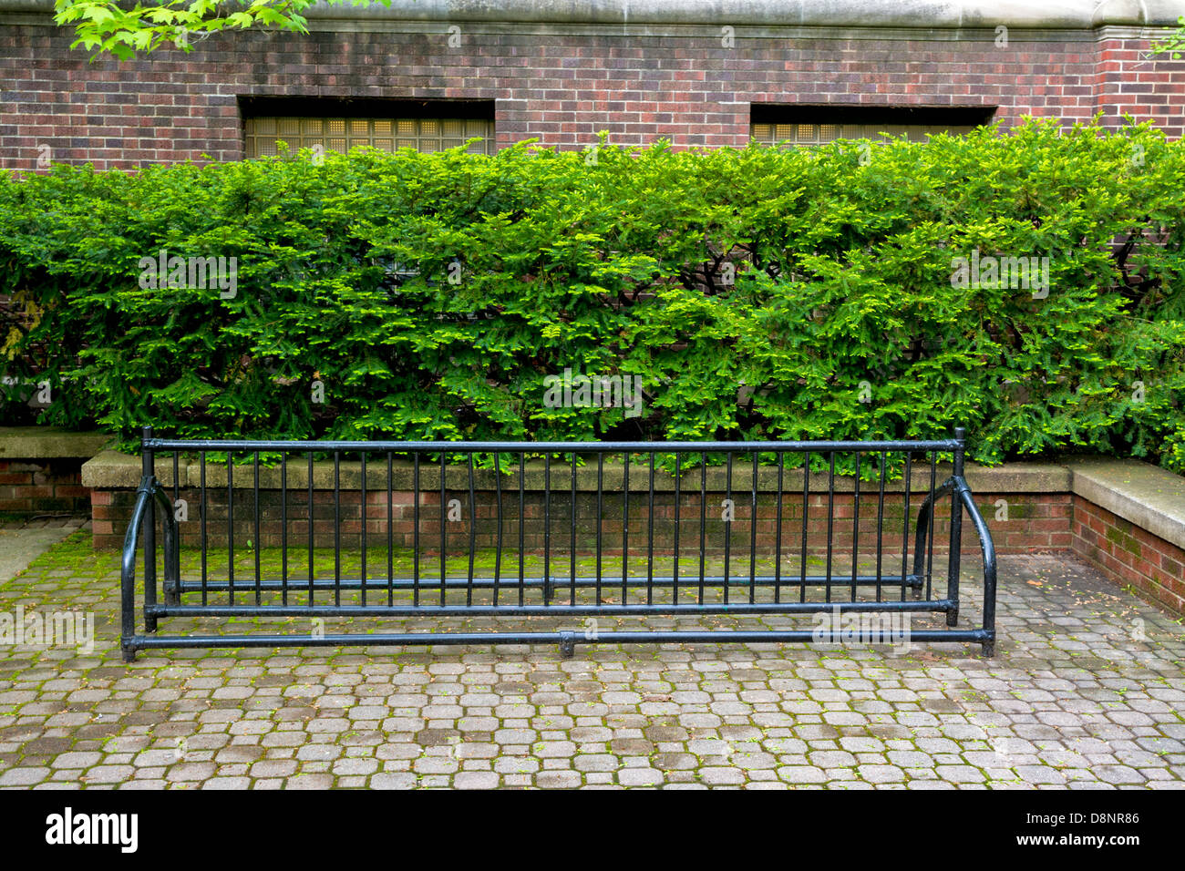 Brick building with a bike rack Stock Photo - Alamy