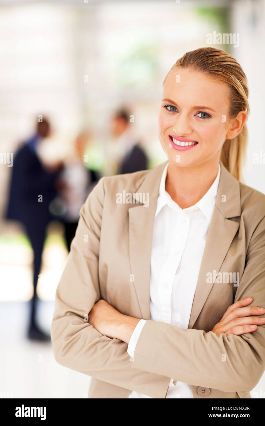 pretty young office worker portrait in modern office Stock Photo - Alamy