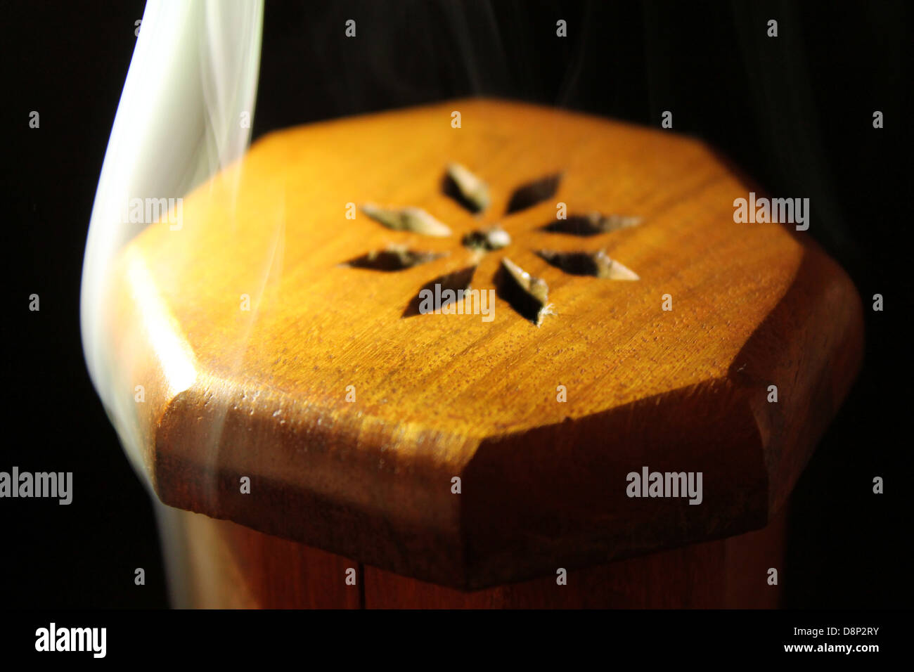 Smoke rising from an incense burner Stock Photo - Alamy