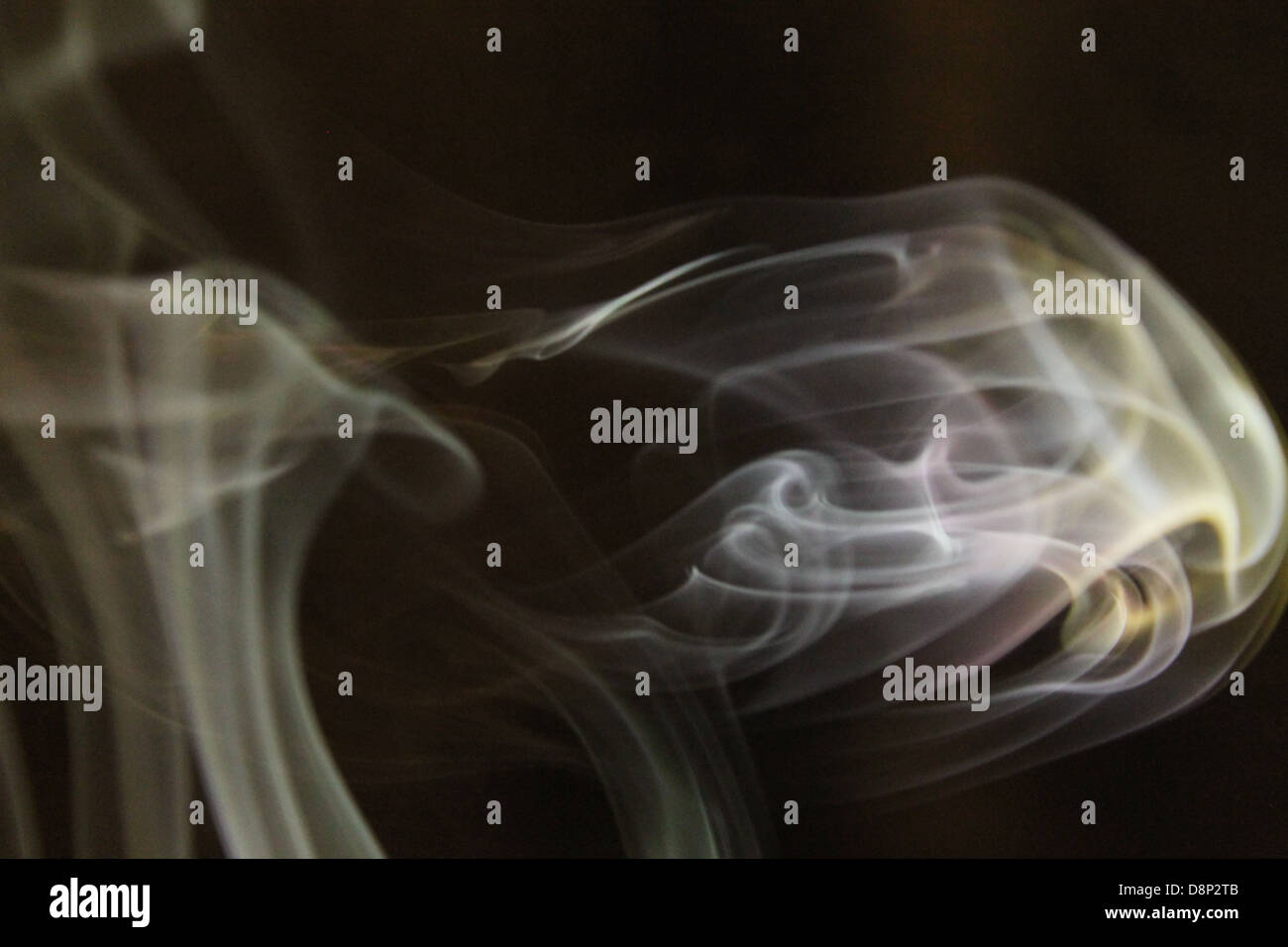 smoke coming from an incense burner Stock Photo - Alamy