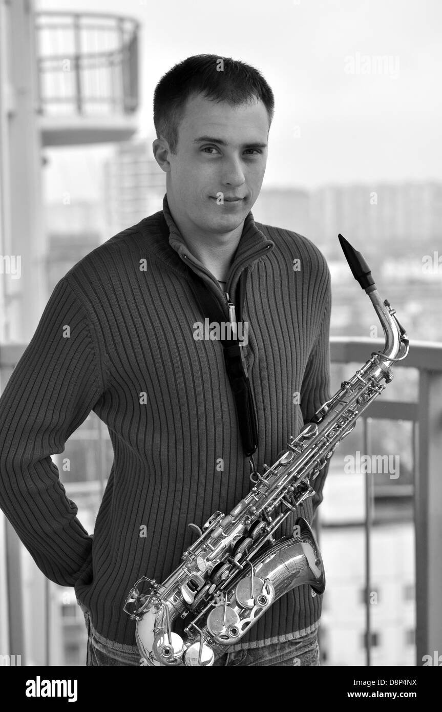 Play the sax Black and White Stock Photos & Images - Alamy