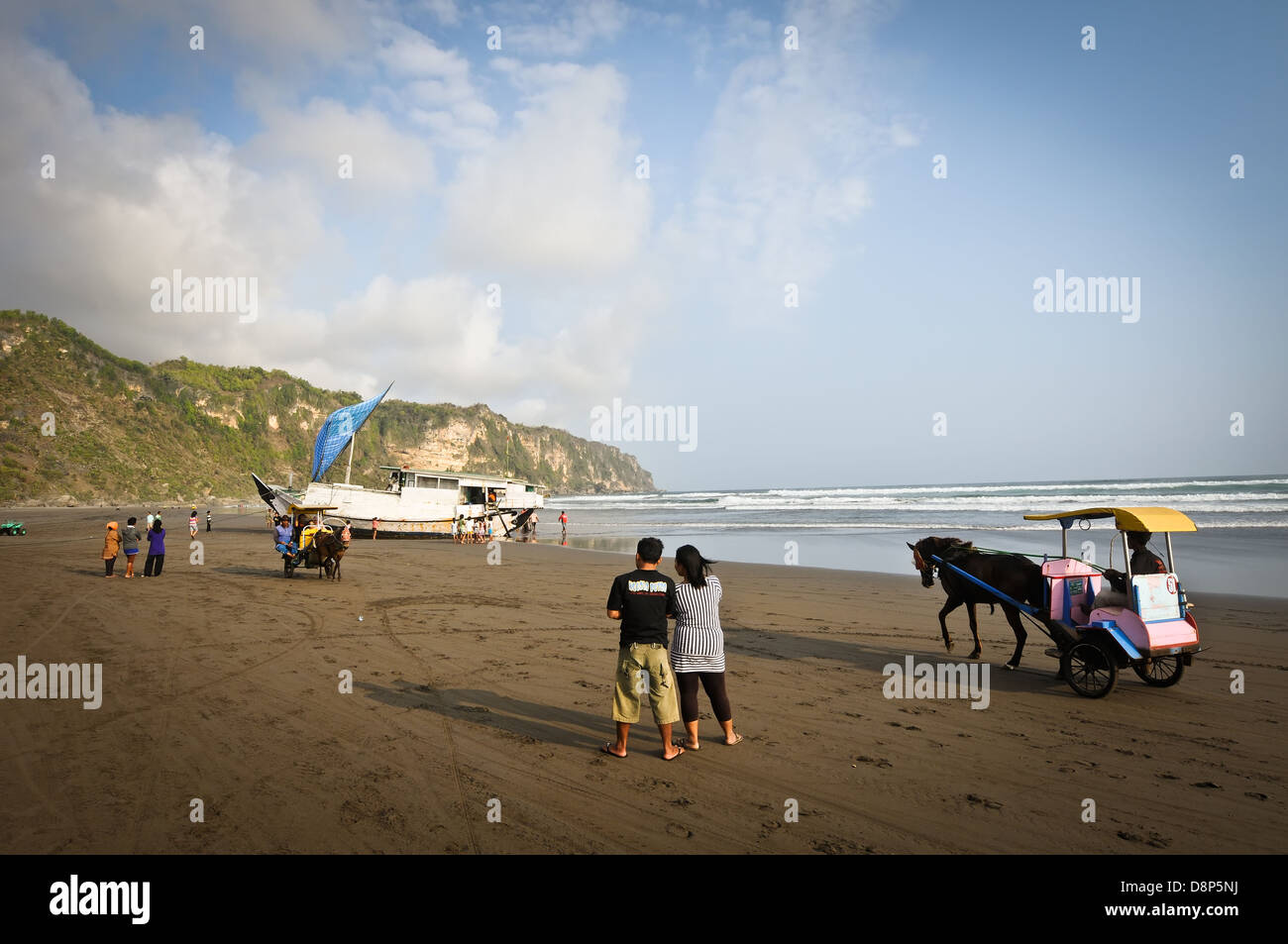 Life on the beach in Parangritis, Indonesia Stock Photo - Alamy