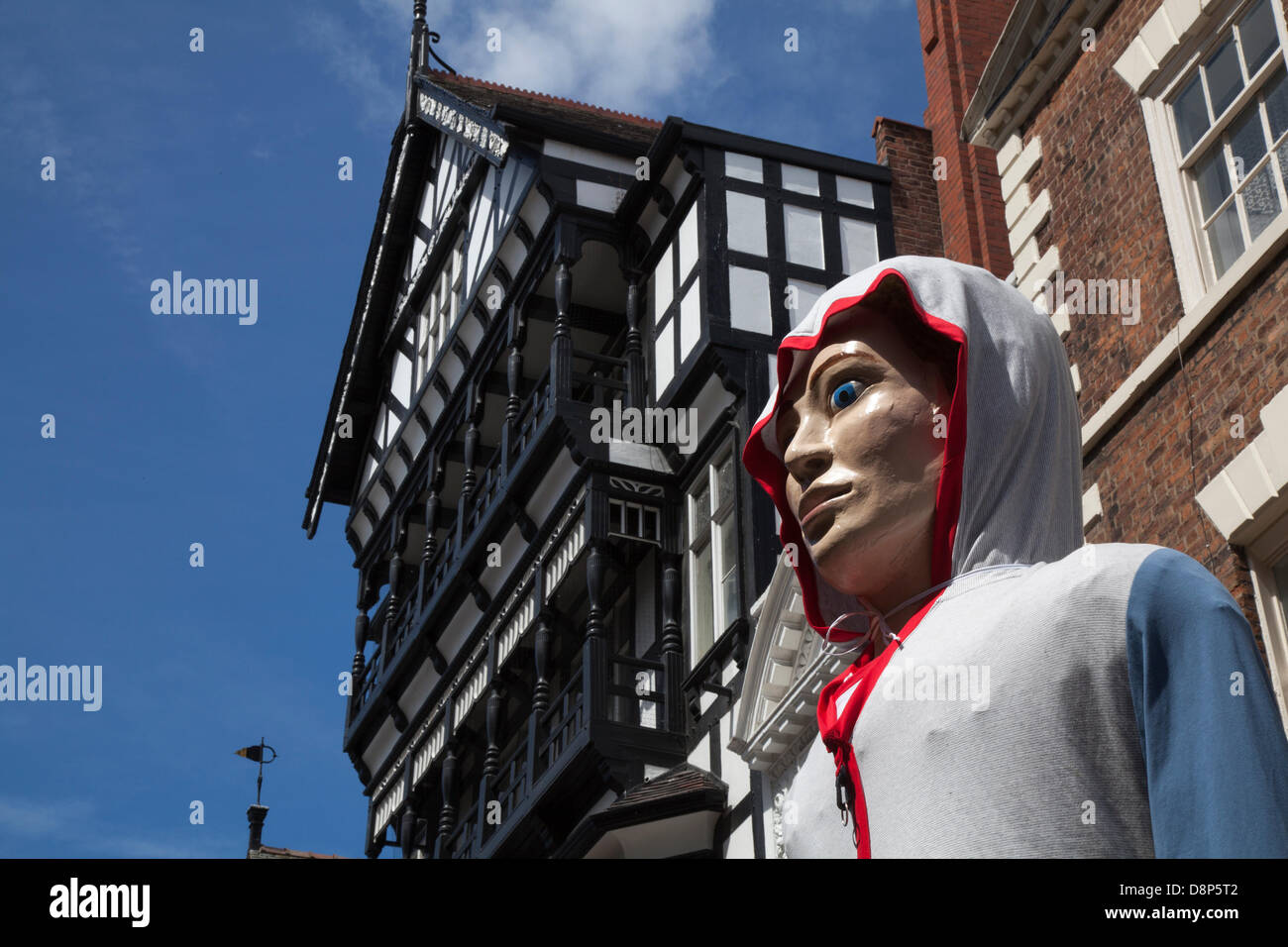 Chester, UK 2nd June, 2013. Giant towering above the crowd at Chester’s ...