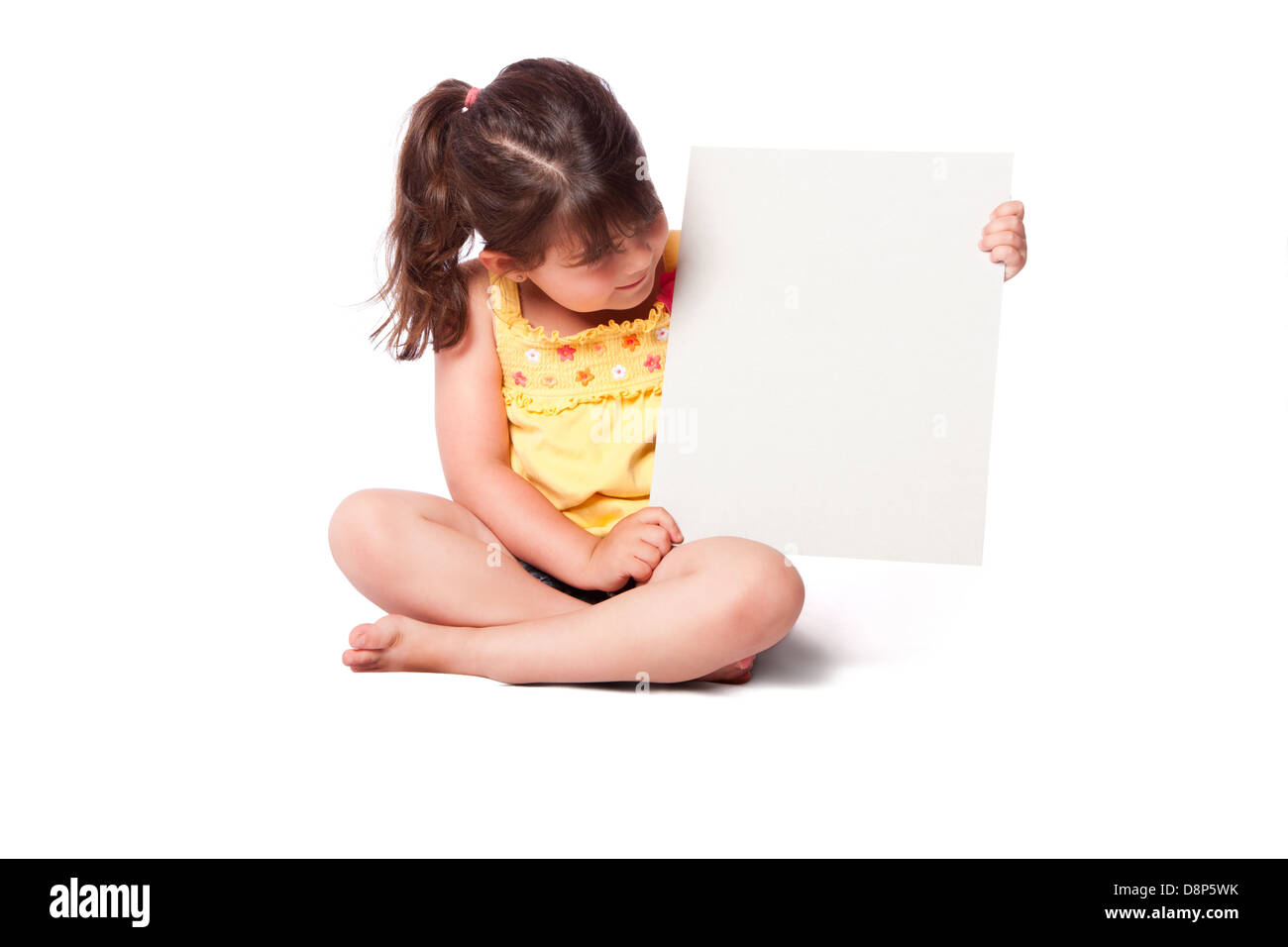 Cute child presenting yellow hi-res stock photography and images - Alamy