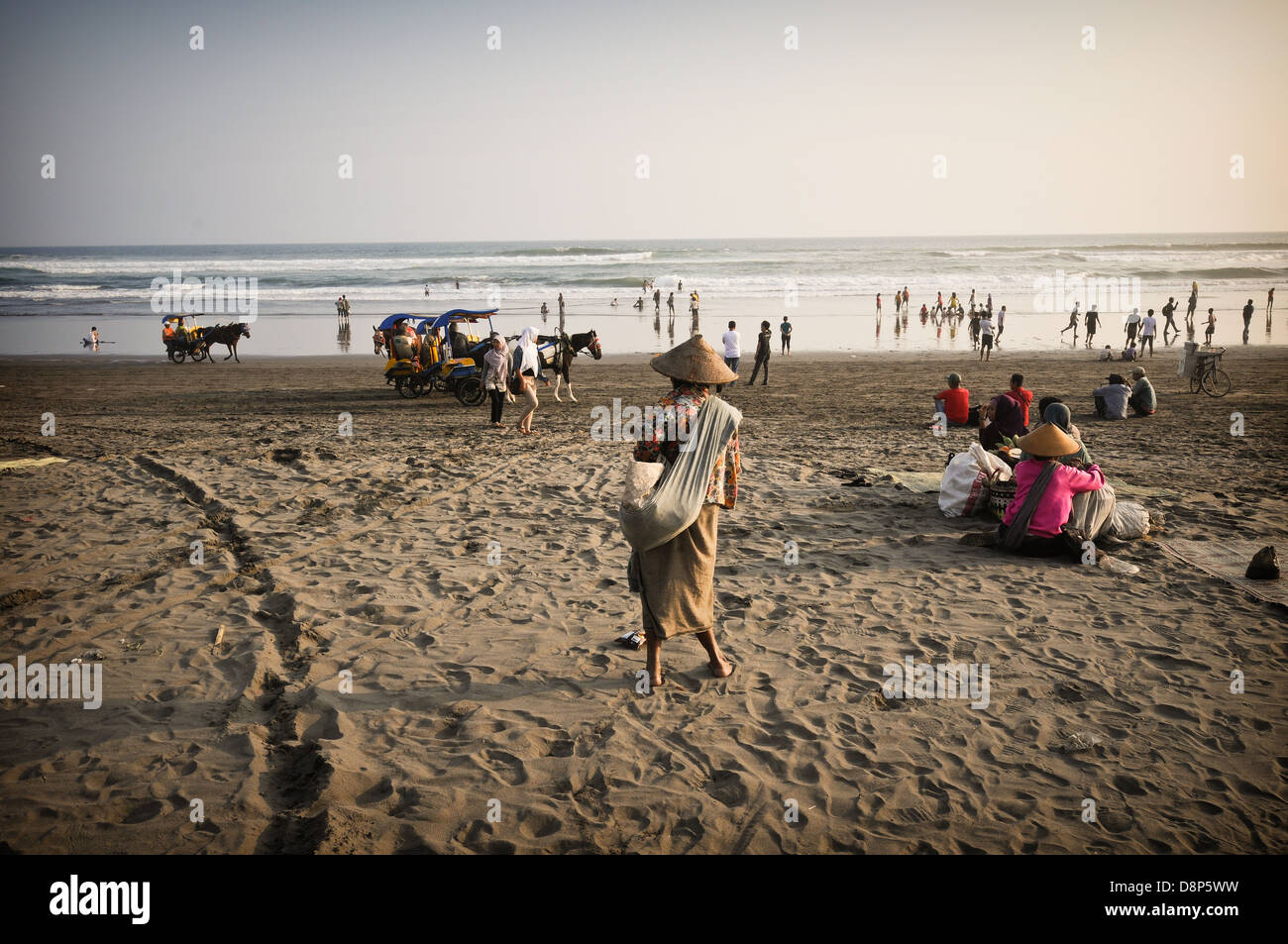 Life on the beach in Parangritis, Indonesia Stock Photo - Alamy