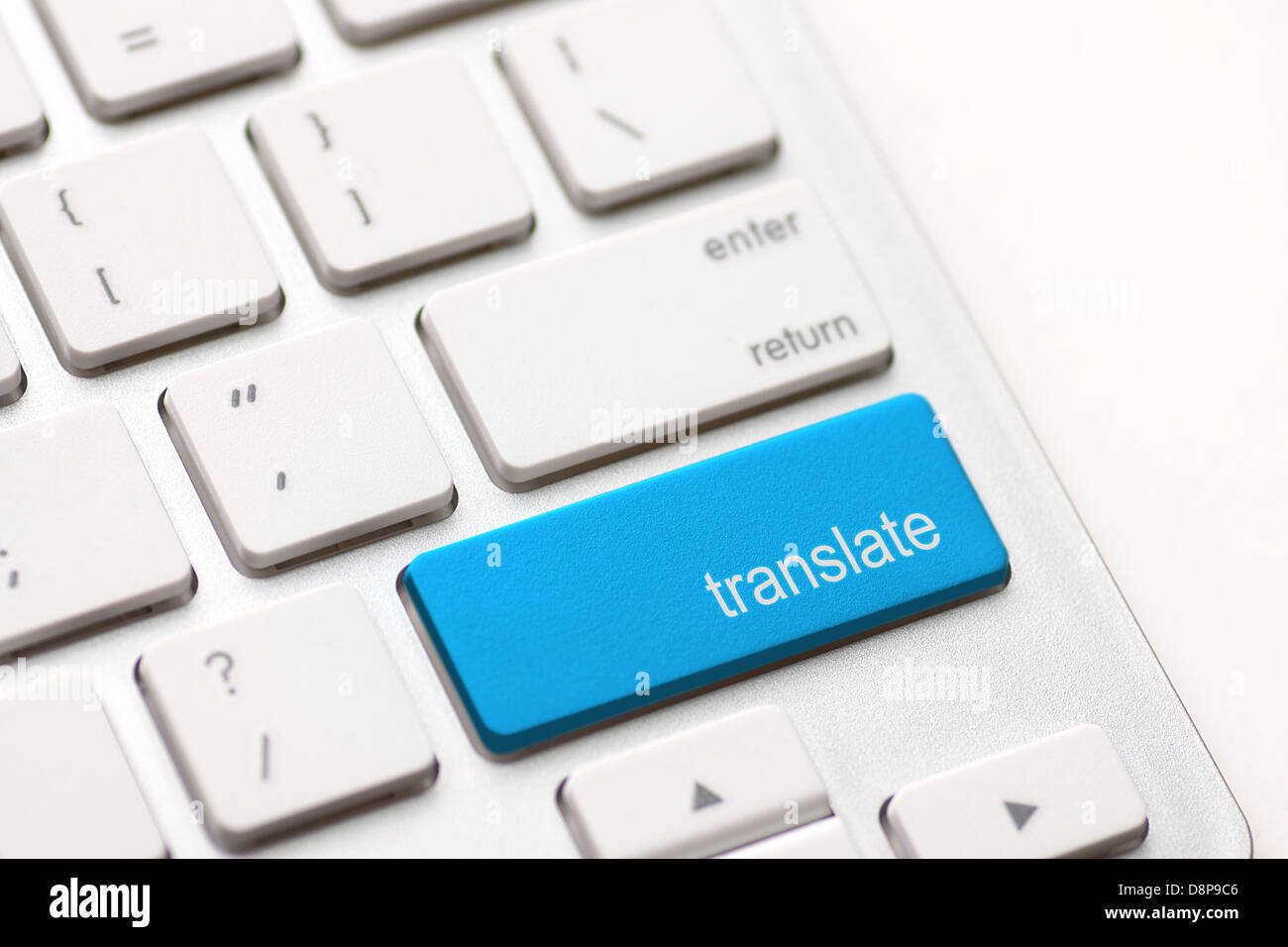 Translate Computer Key In blue Showing Online Translator Stock Photo ...