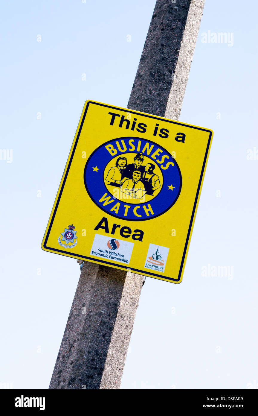 Business watch crime prevention area sign Stock Photo - Alamy