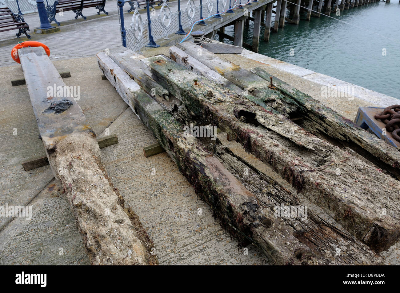 rotting pier timber piles removed from swanage pier by contractors ...