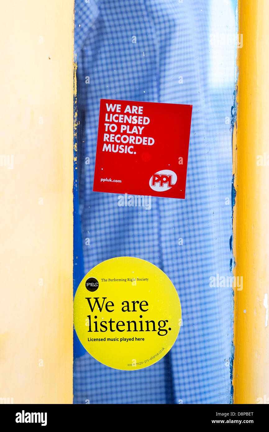 PRS Performing Rights Society sticker in shop window denoting that they ...